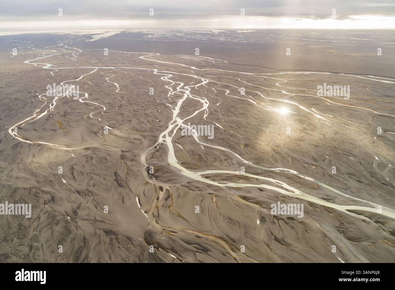 Aerial abstract view of river flowing through plateau in Skaftafell ...