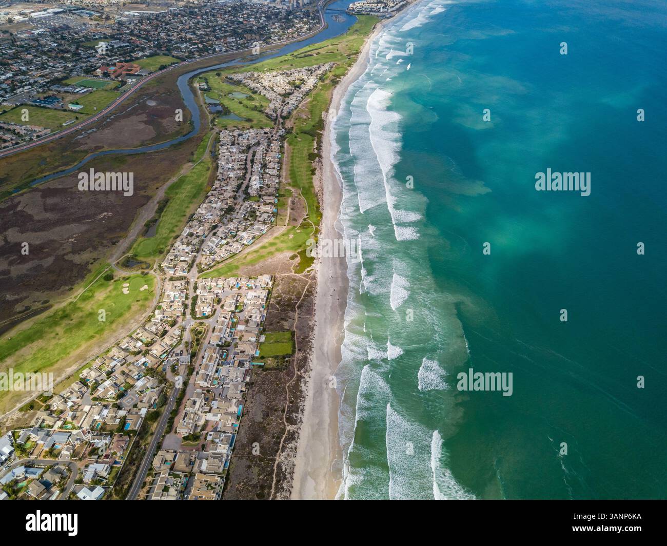 Aerial view of Sunset Beach and residential area, Cape Town, South ...