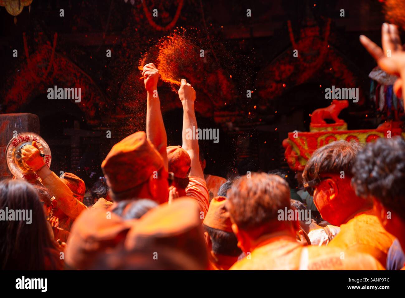 Bhaktapur, Nepal. 15th Apr, 2025. Nepalese revelers throw vermilion ...