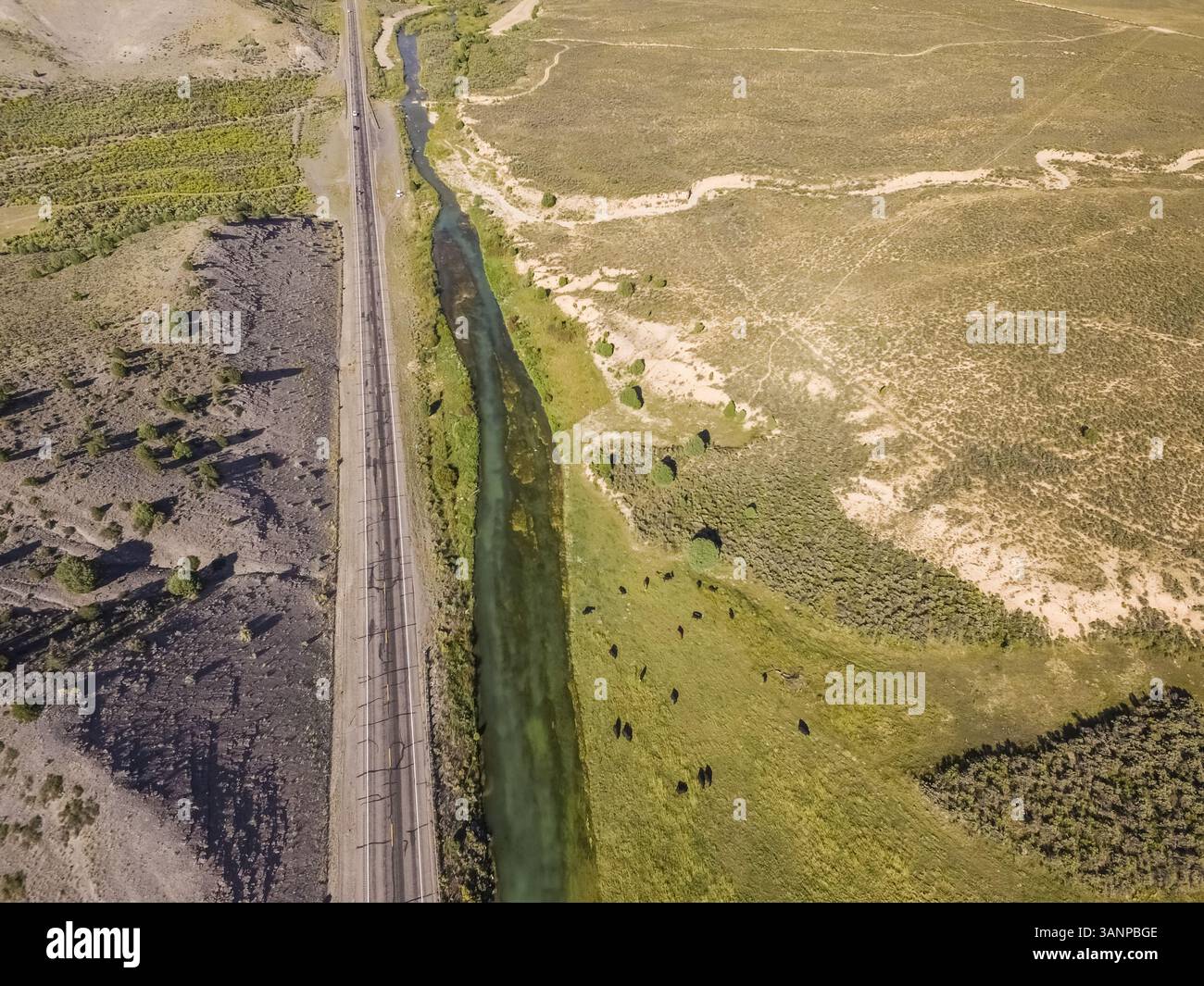 Aerial view of sevier blue river following the road in Hatch, Utah, USA ...