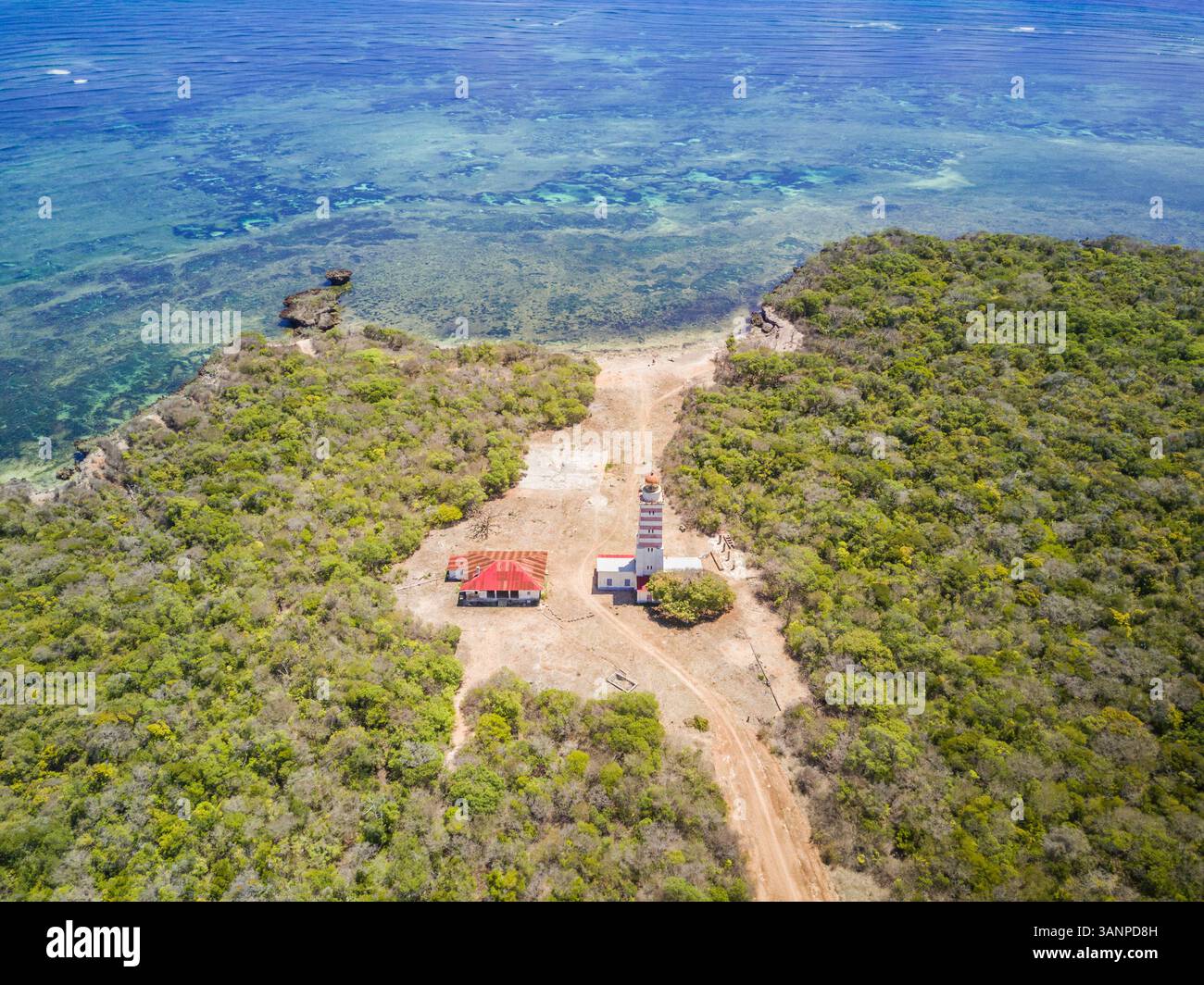 Aerial view of a lighthouse and beautiful blue sea on Mafia Island ...