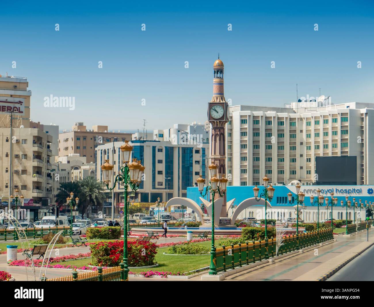 Sharjah, United Arab Emirates. Zahra Clock Tower fountain and ...