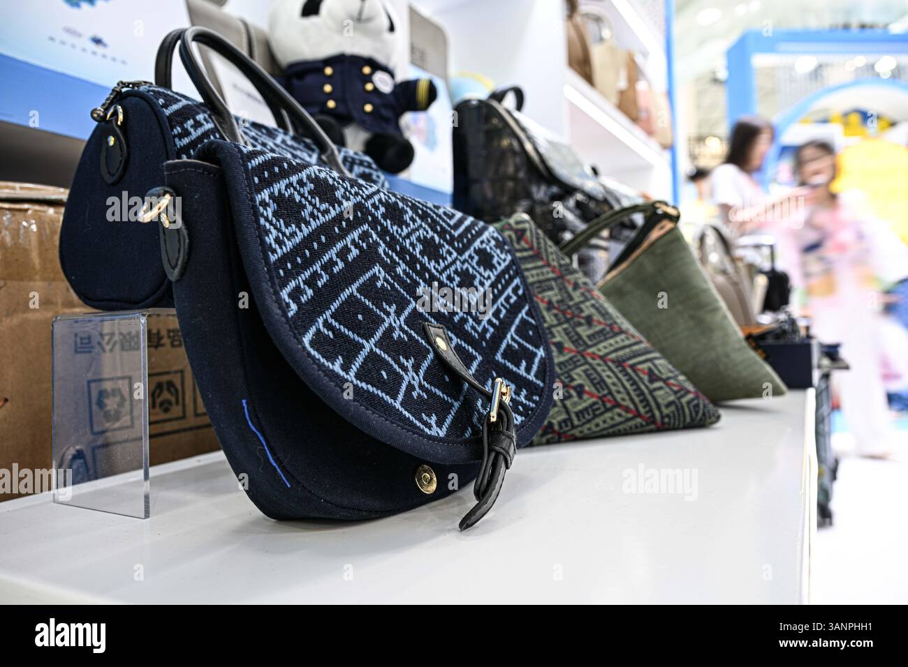 Haikou, China's Hainan Province. 15th Apr, 2025. Li brocade handbags ...