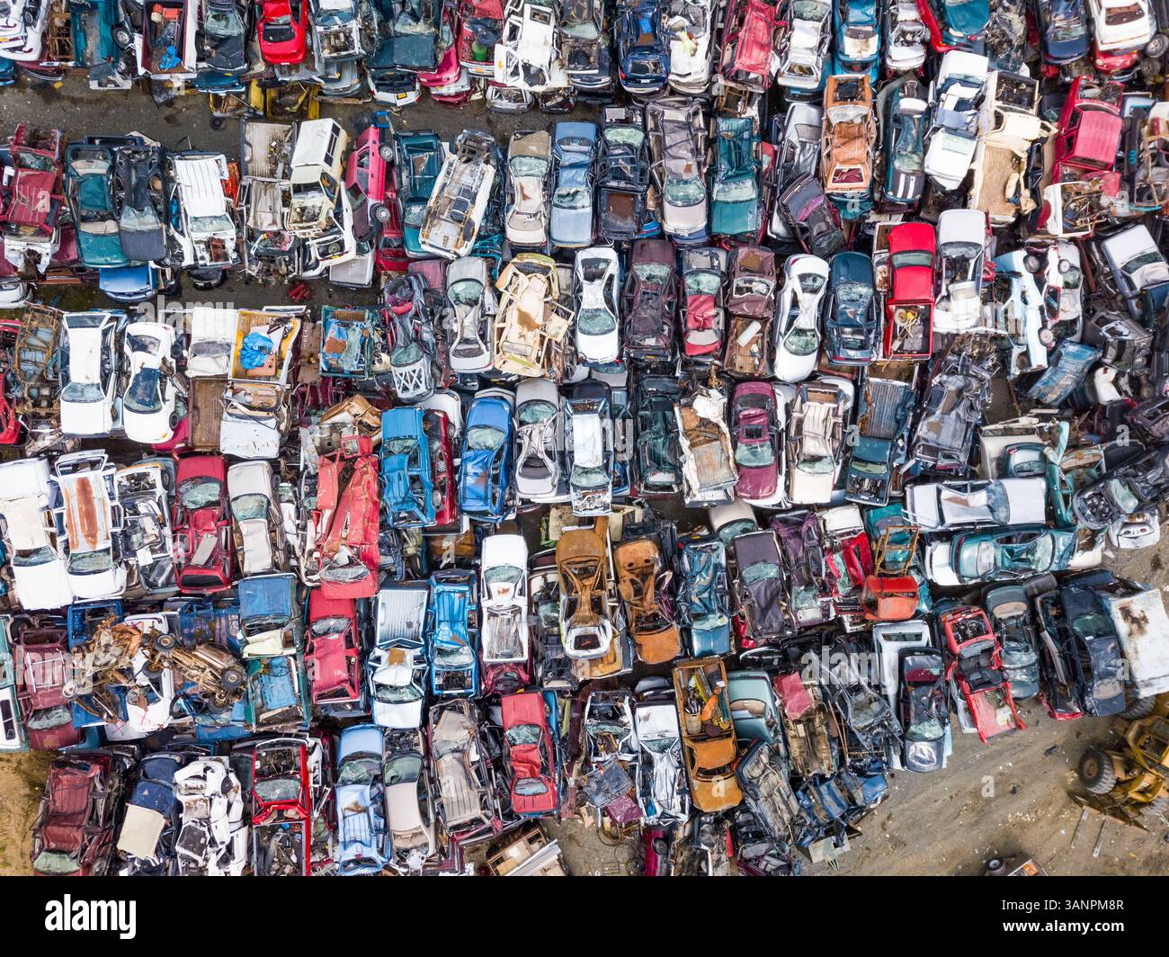 Aerial view above of small junkyard with rusty cars, Wasilla, Alaska ...