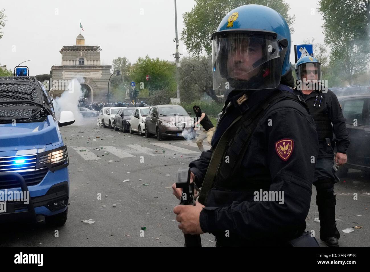 Lazio fans clash with Italian Policemen in riot gears outside the ...