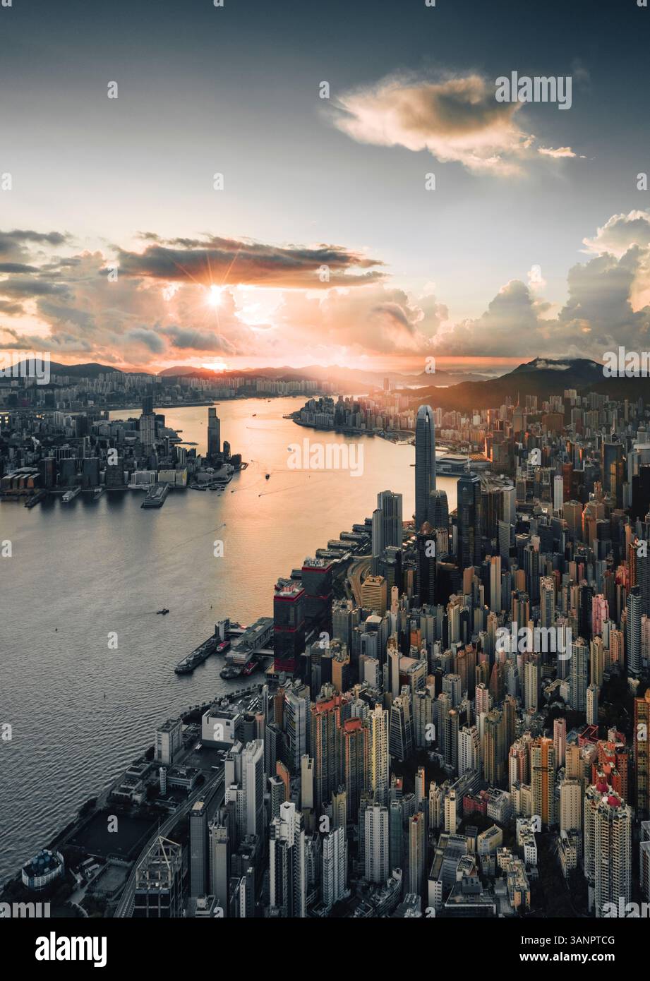 Aerial view of Hong Kong skyline at sunset along Hong Kong Island ...
