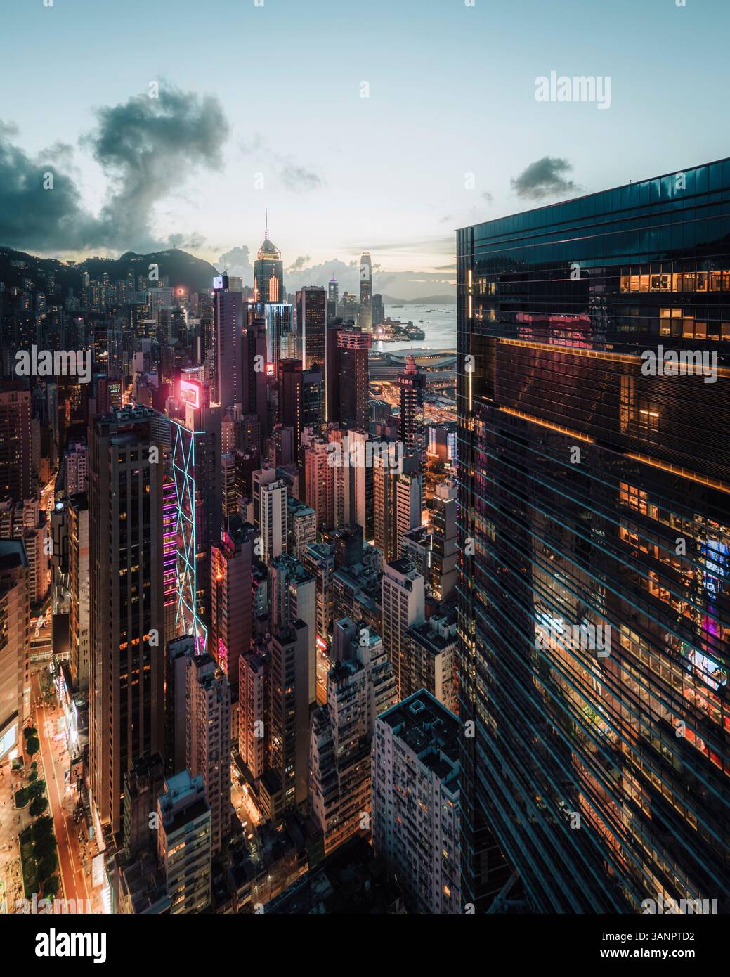 Aerial view of Hong Kong skyline and the financial district at sunset ...