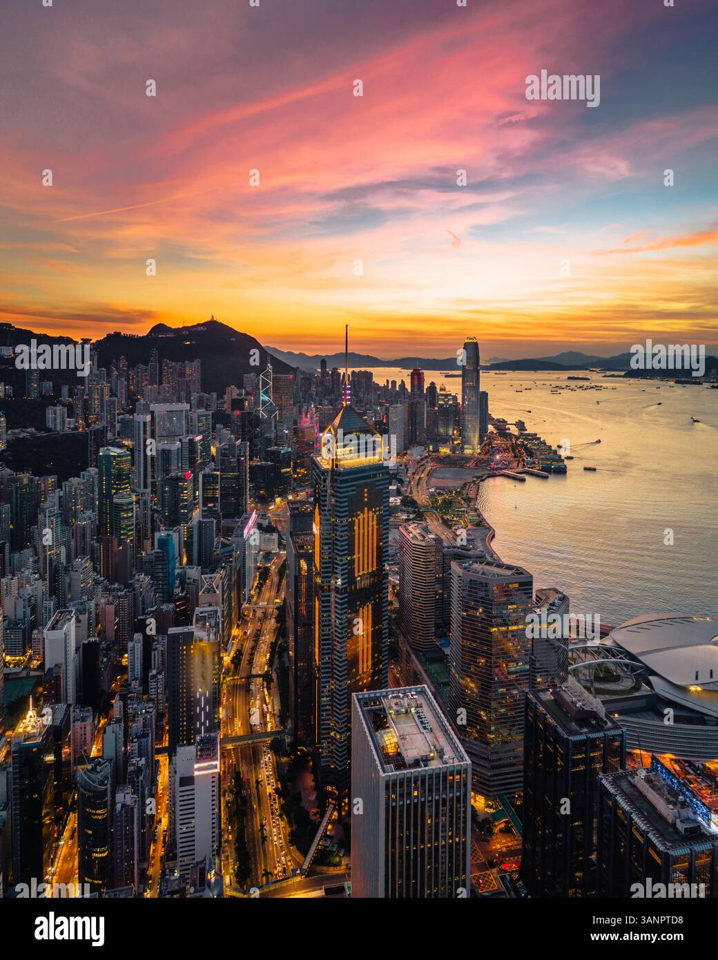 Aerial view of Hong Kong skyline at sunset along Hong Kong Island ...