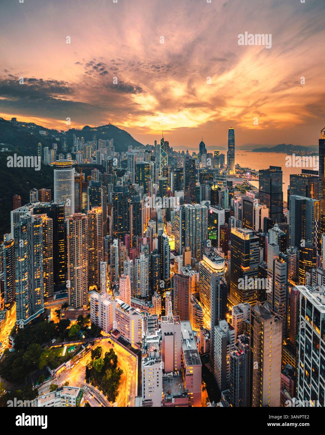 Aerial view of Hong Kong skyline at sunset along Hong Kong Island ...