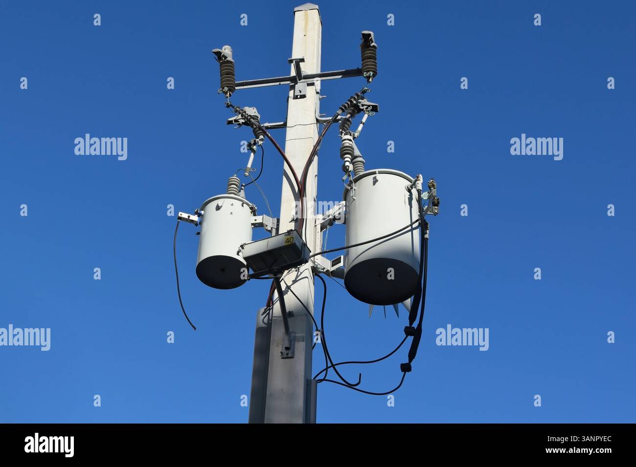 Power transformers on a pole to power the building Stock Photo - Alamy