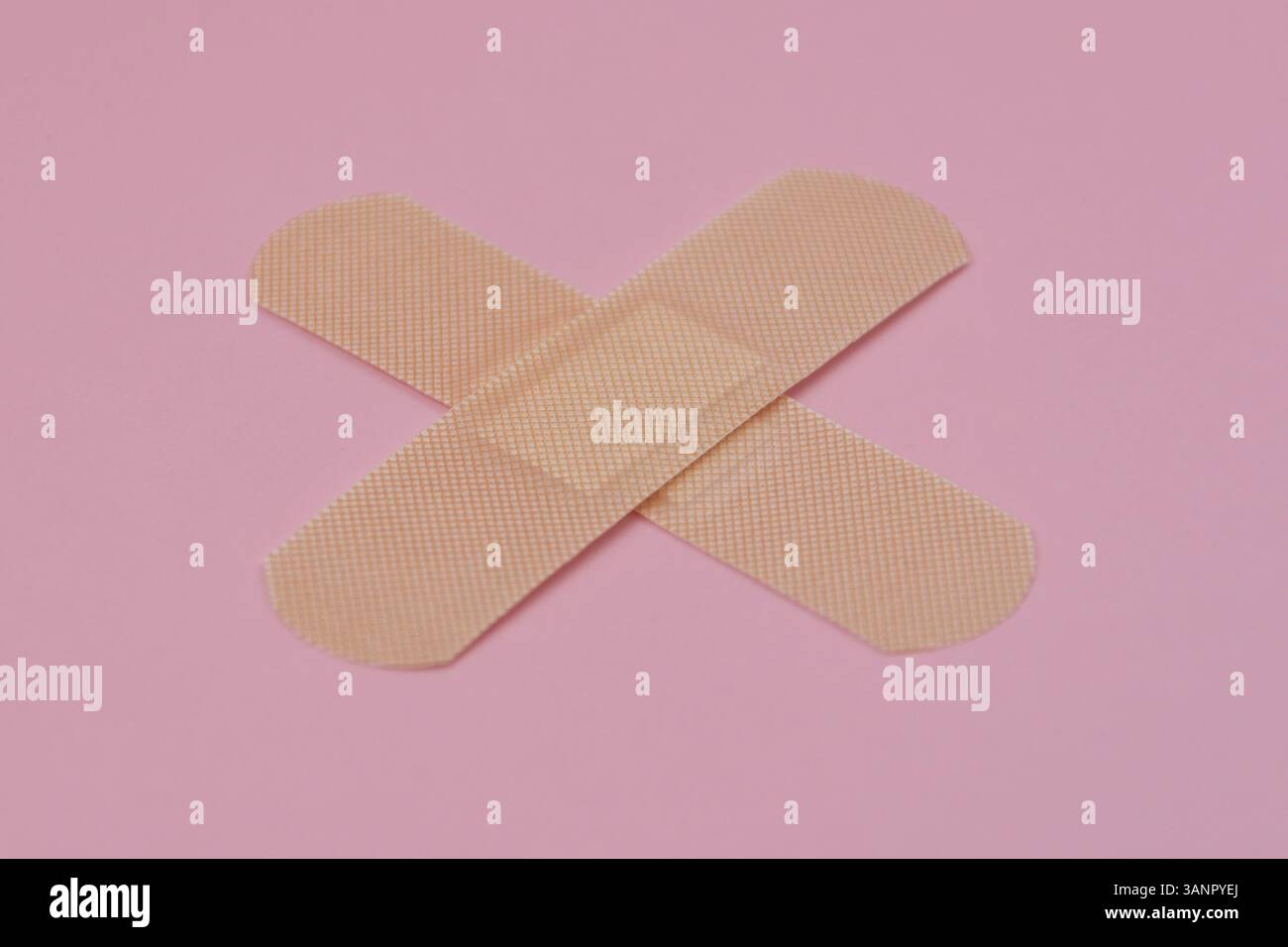 Medical sticking plasters on pink background. First aid. Medical ...
