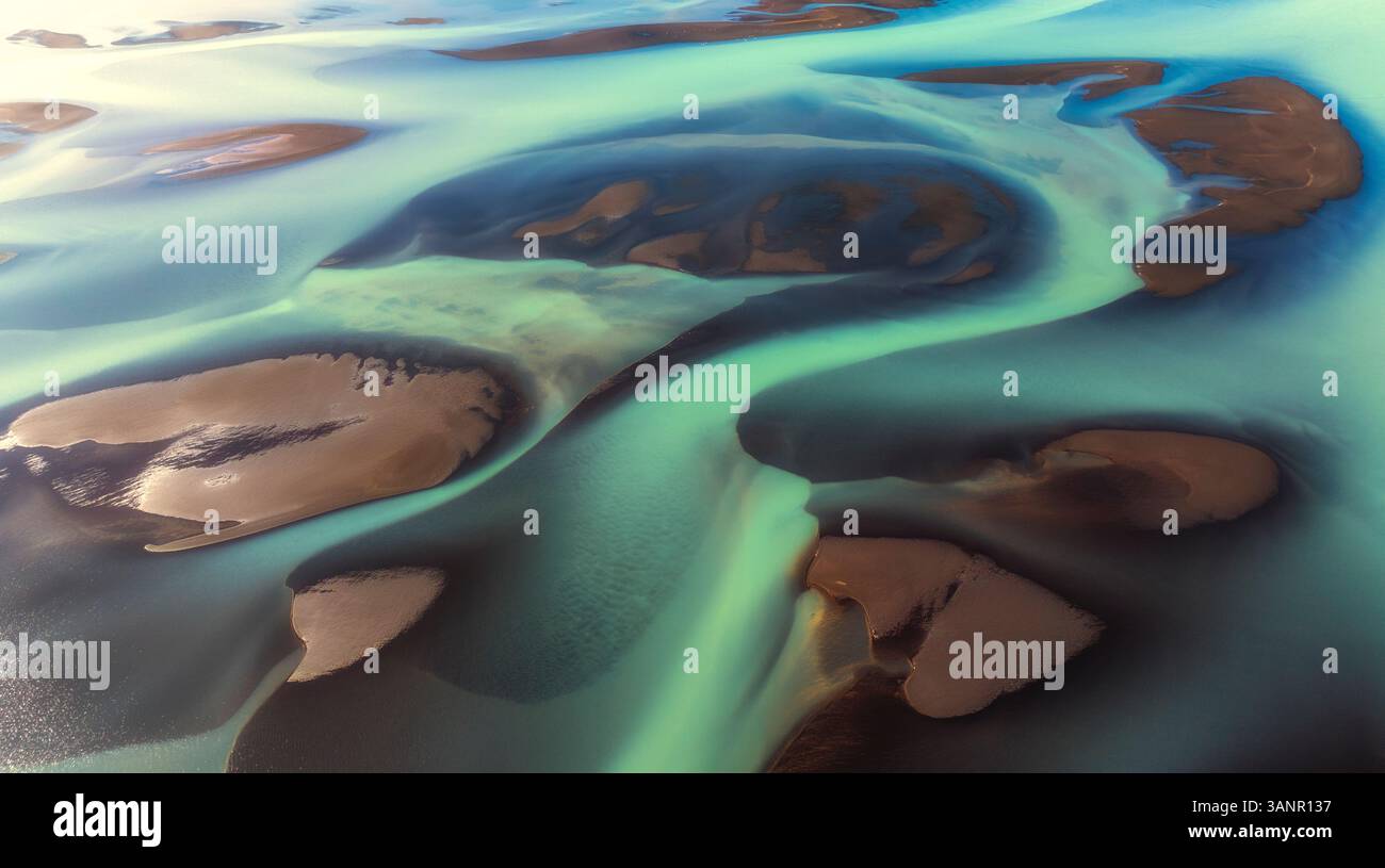 Aerial view of beautiful braided rivers in a scenic landscape, Selfoss ...