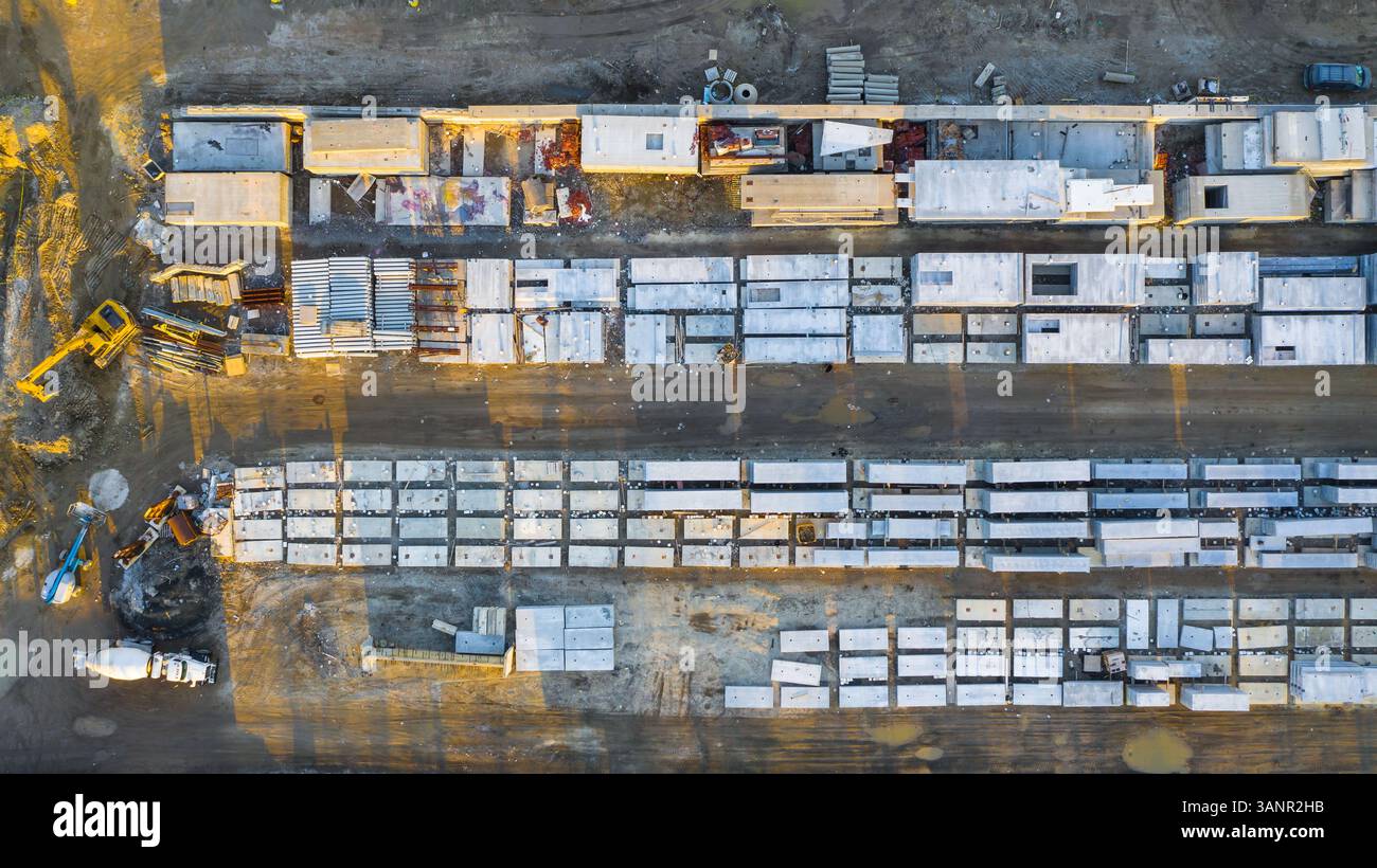 Aerial view of finished concrete slabs and related products at a ...