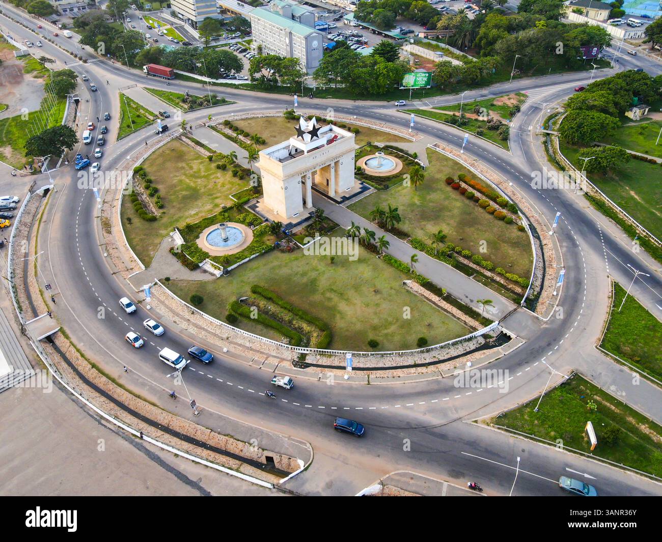 Aerial view of Independence Arch and cityscape with winding roads and ...
