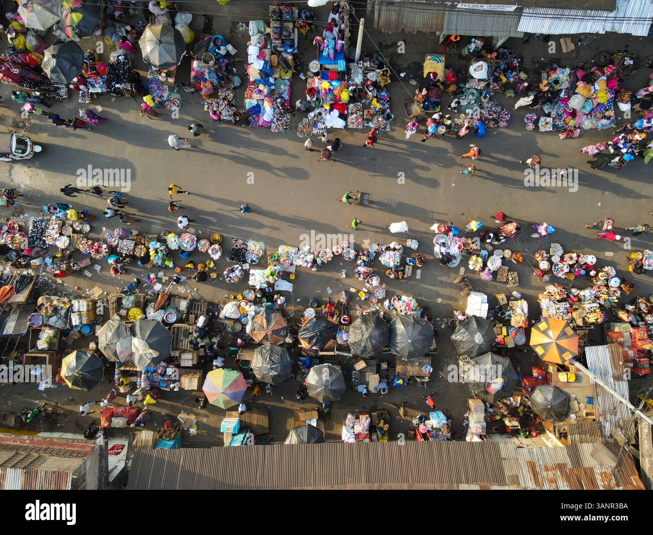 Aerial view of people in the street at the city market in Freetown ...