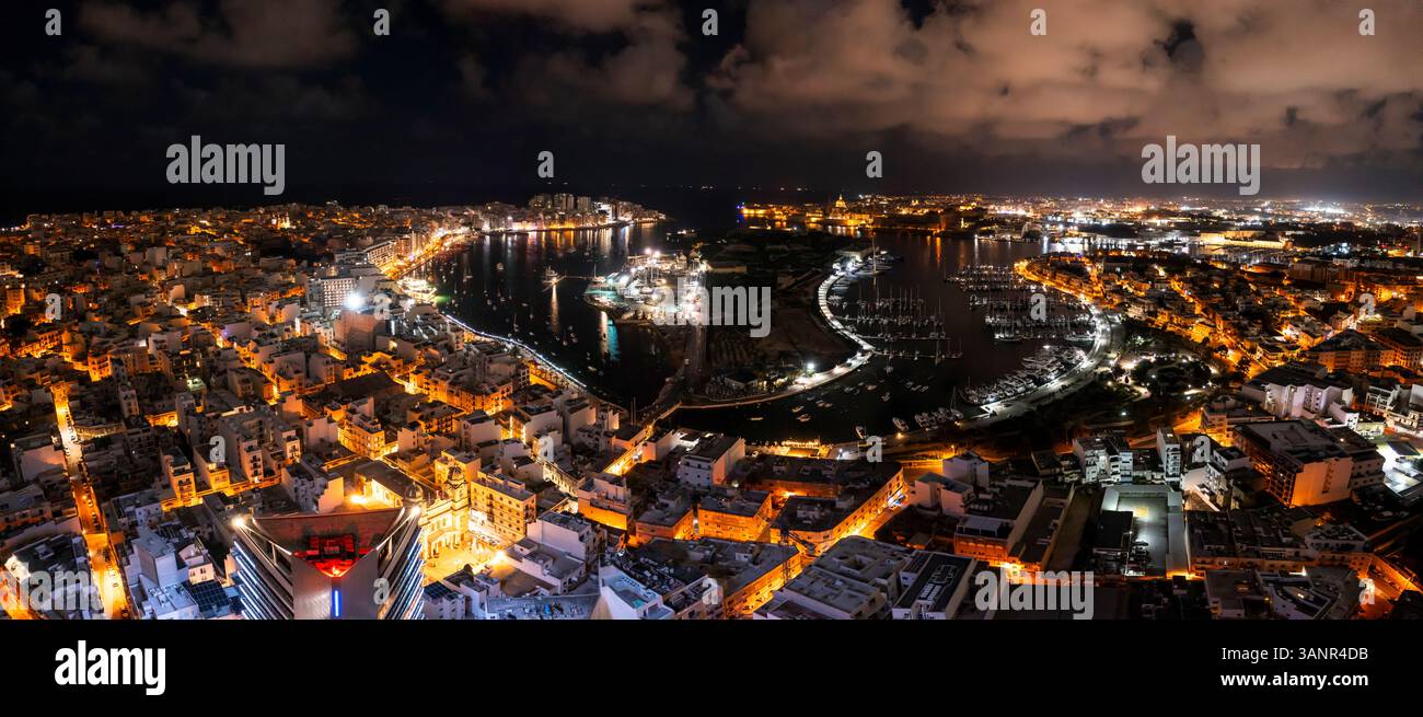Aerial view of dense urban cityscape at night, Gzira, Malta Stock Photo ...