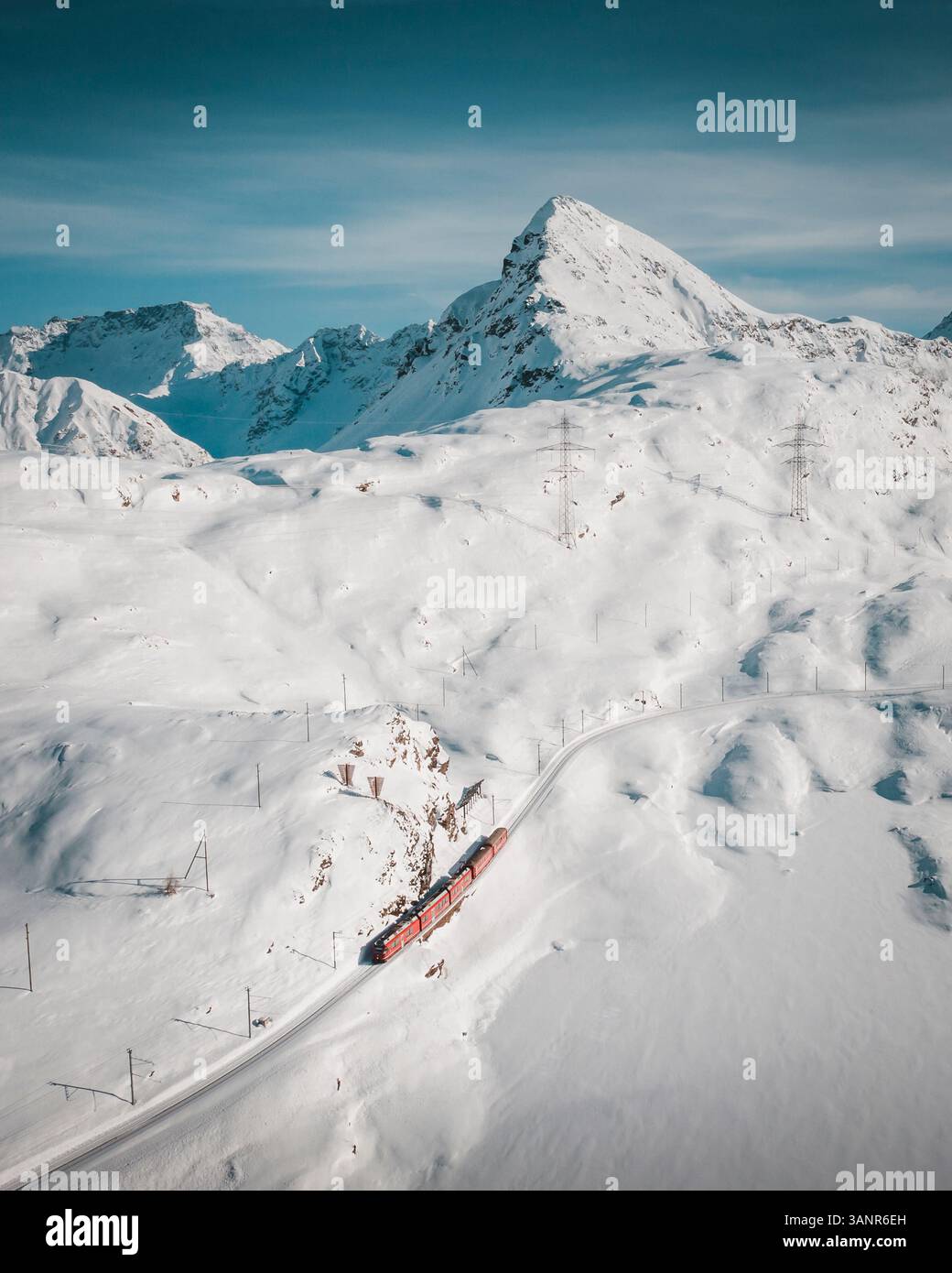 Aerial Drone view of the Bernina Express Train traversing the ...