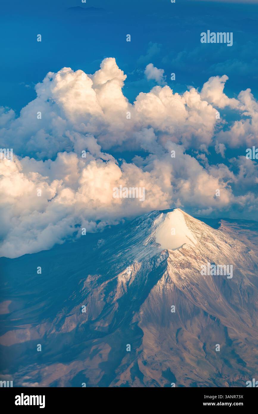 Aerial view of pico de orizaba volcano with snow capped peak and ...