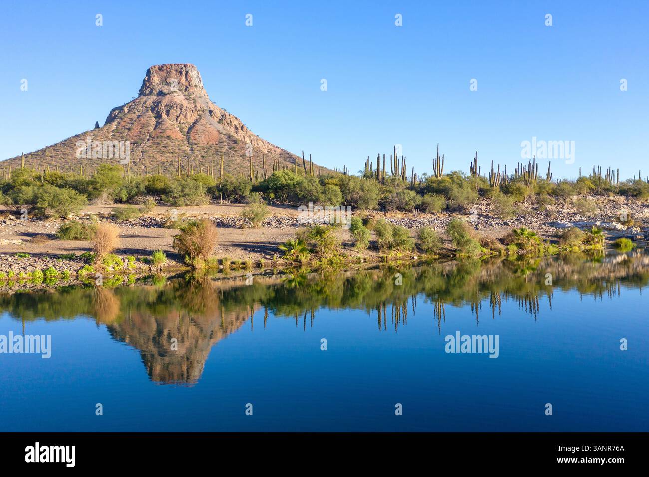 Aerial view of pilon hill surrounded by serene desert landscape with ...