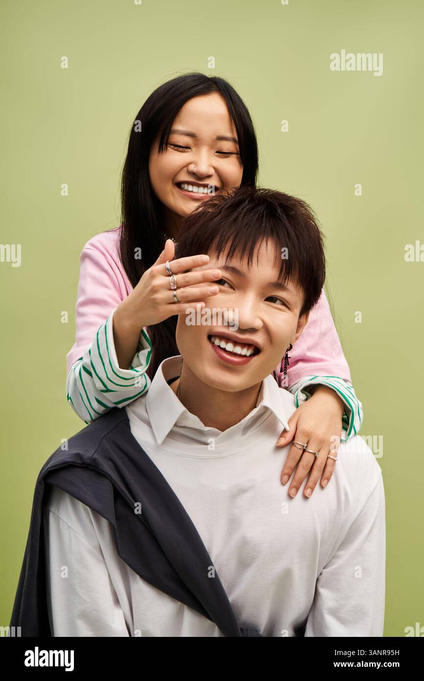 A couple shares a joyful moment, highlighting their love and playful ...