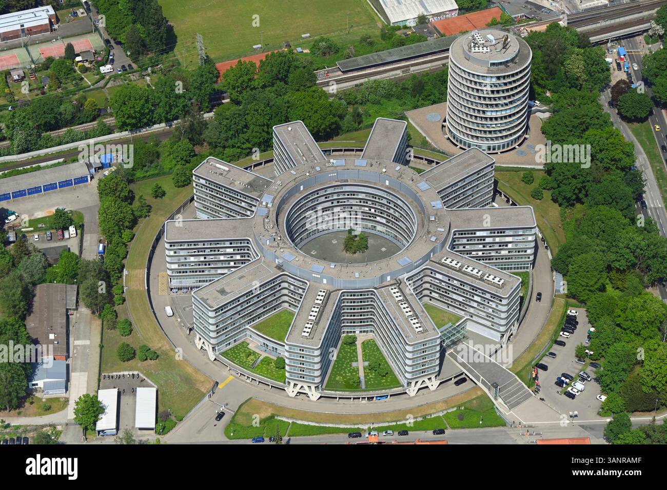 Aerial view of modern urban architecture with circular structures and ...