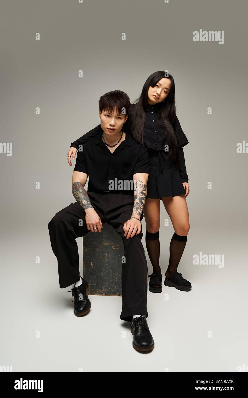 A lovely couple showcases their fashion sense and strong connection in ...