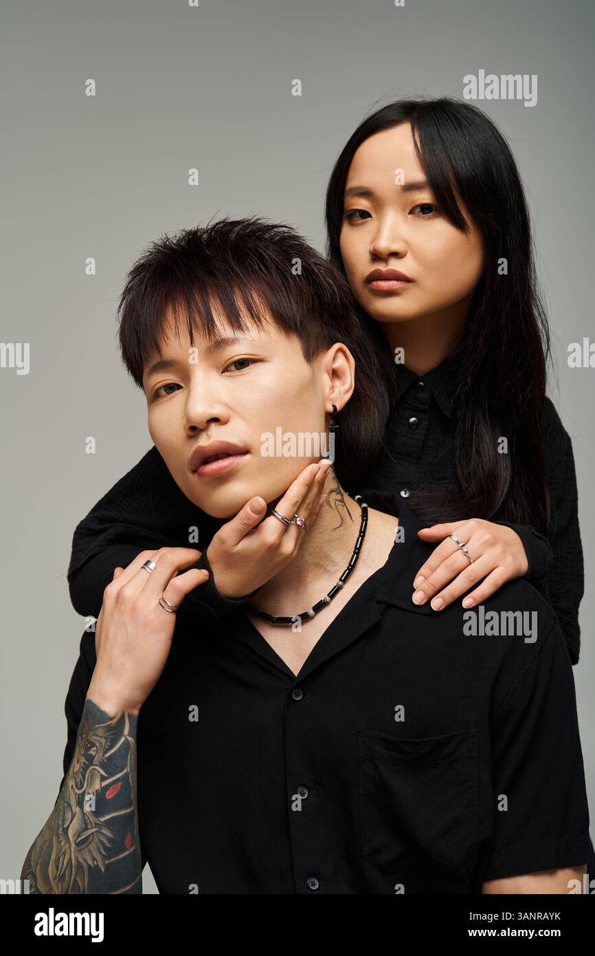 A lovely couple showcases their fashion sense while sharing an intimate ...