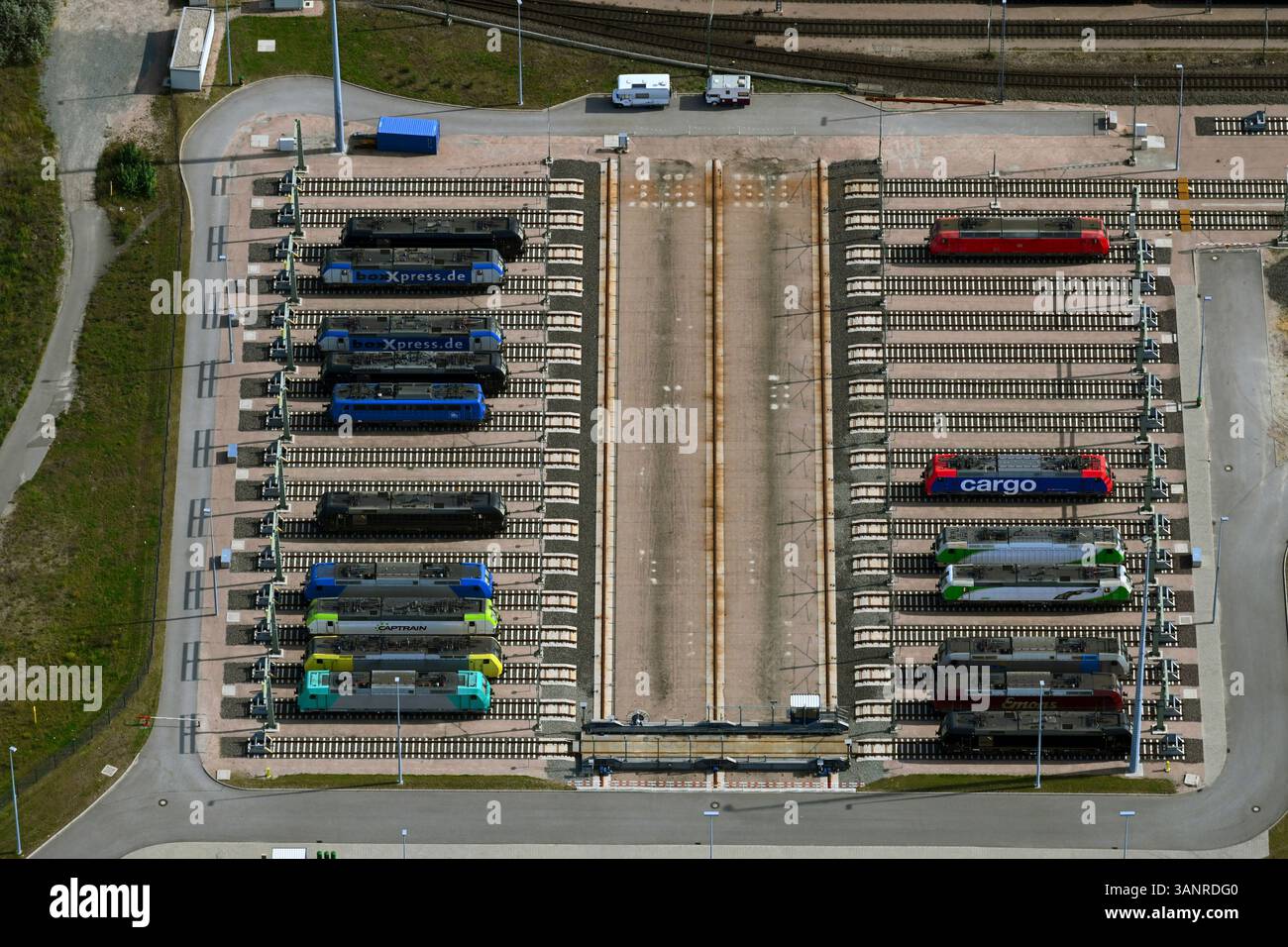 Aerial view of trains depot with railroad tracks and industrial ...