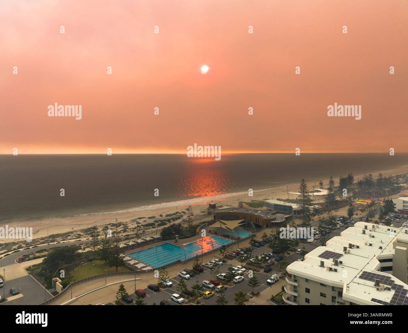 Aerial view of serene sunset over Scarborough Beach pool, Perth ...