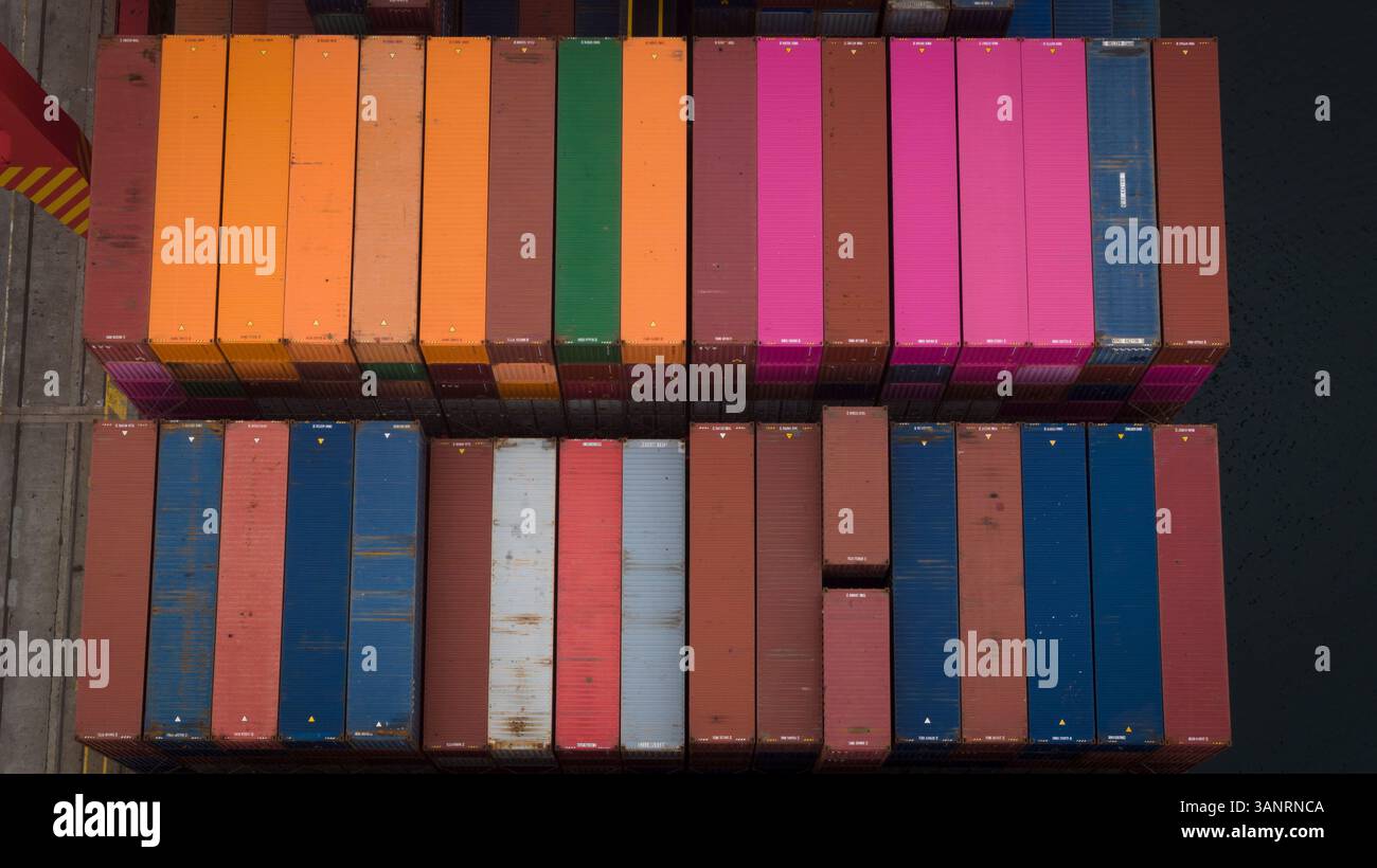 Aerial view of colorful shipping containers stacked at the dock, North ...