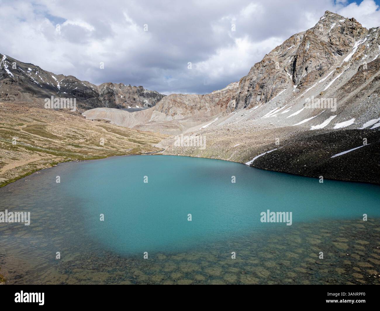 Aerial view of serene Deosai National Park with a beautiful lake and ...