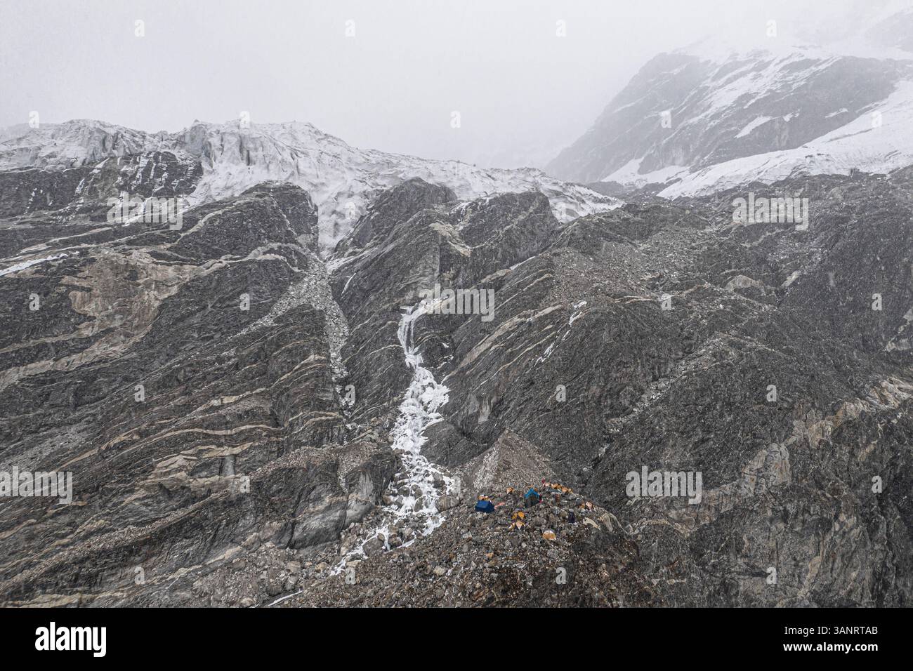 Aerial view of snowy mountain peaks and glacier at Rolwaling valley ...