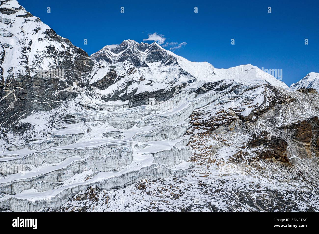 Aerial view of snow-capped mountain and glacier, Amphu Lapsa Pass ...