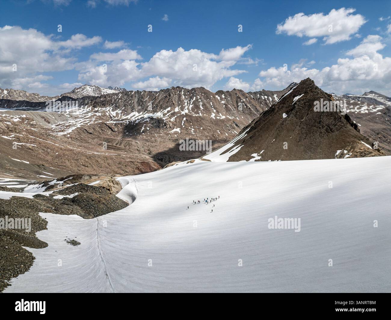Aerial view of majestic snow-capped mountains and pristine landscapes ...