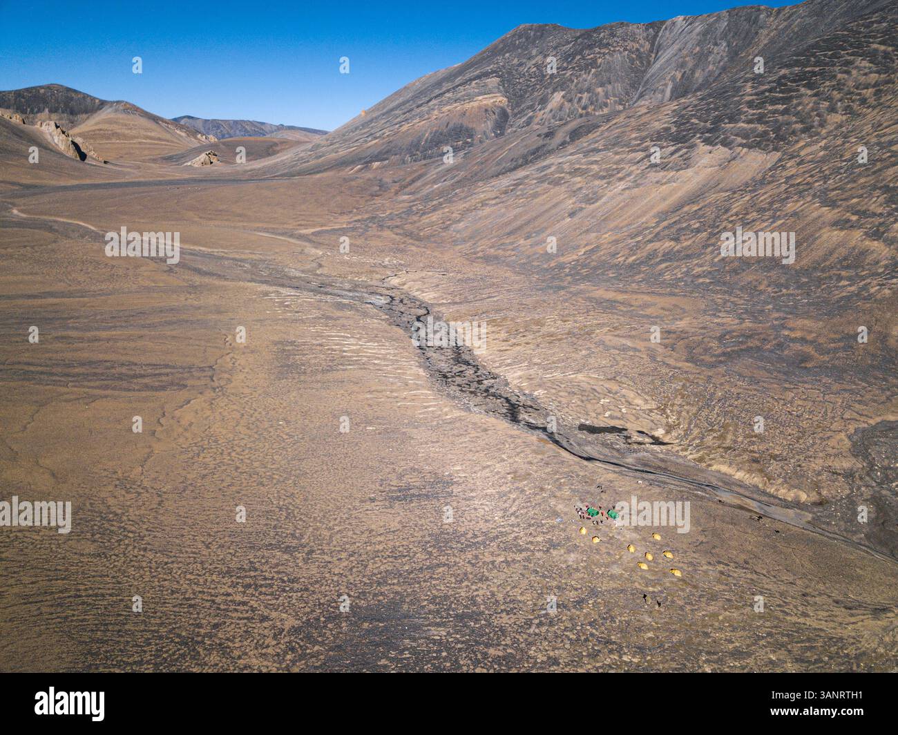Aerial view of remote campsite with Gaugiri mount, Surkhang, Nepal ...