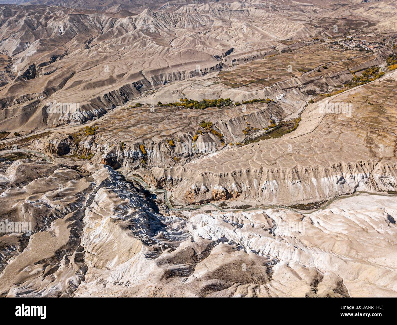 Aerial view of majestic mountains and rugged desert in Mustang, Lo ...