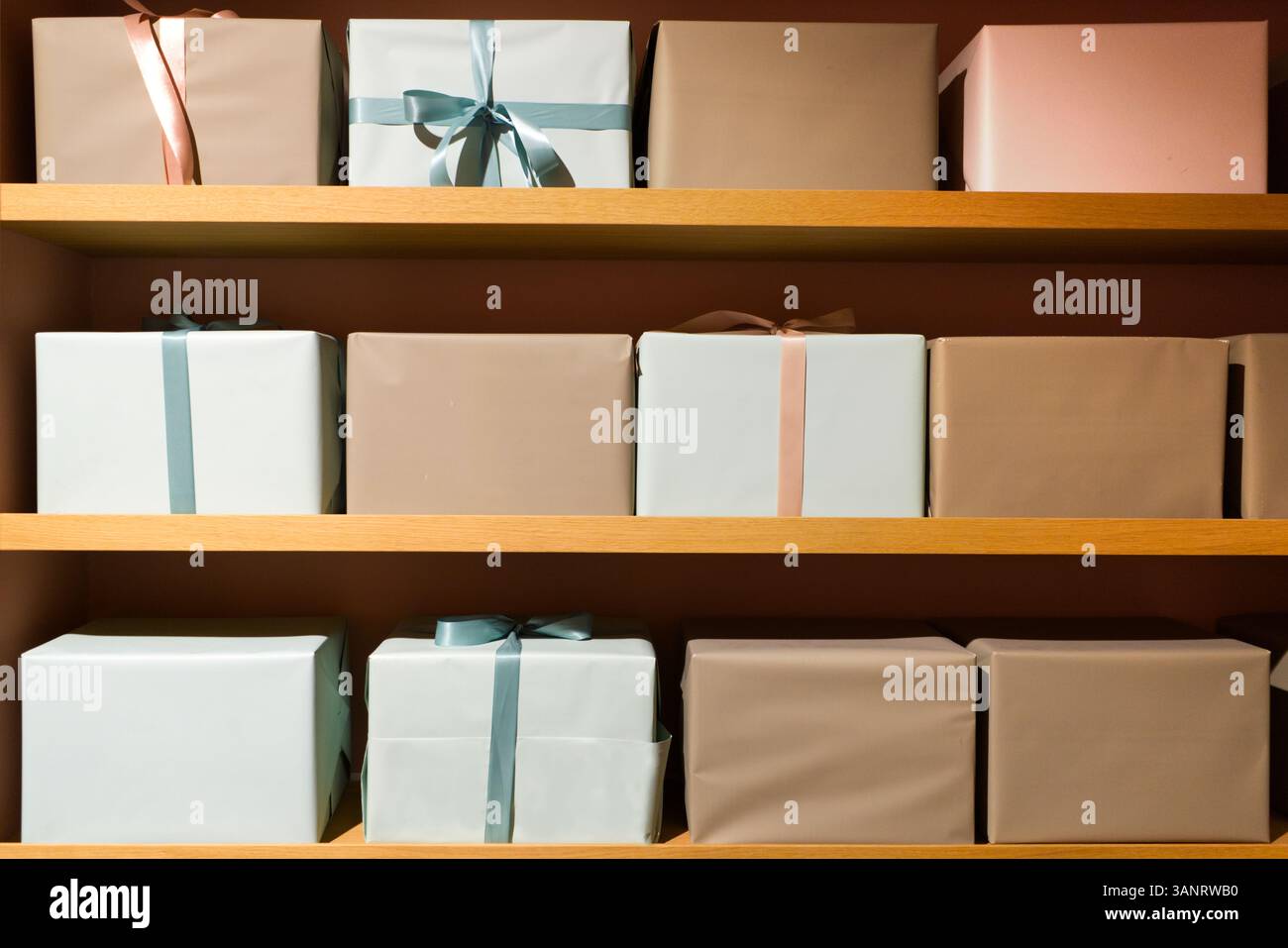 The image features beautifully wrapped gift boxes in pastel colors ...
