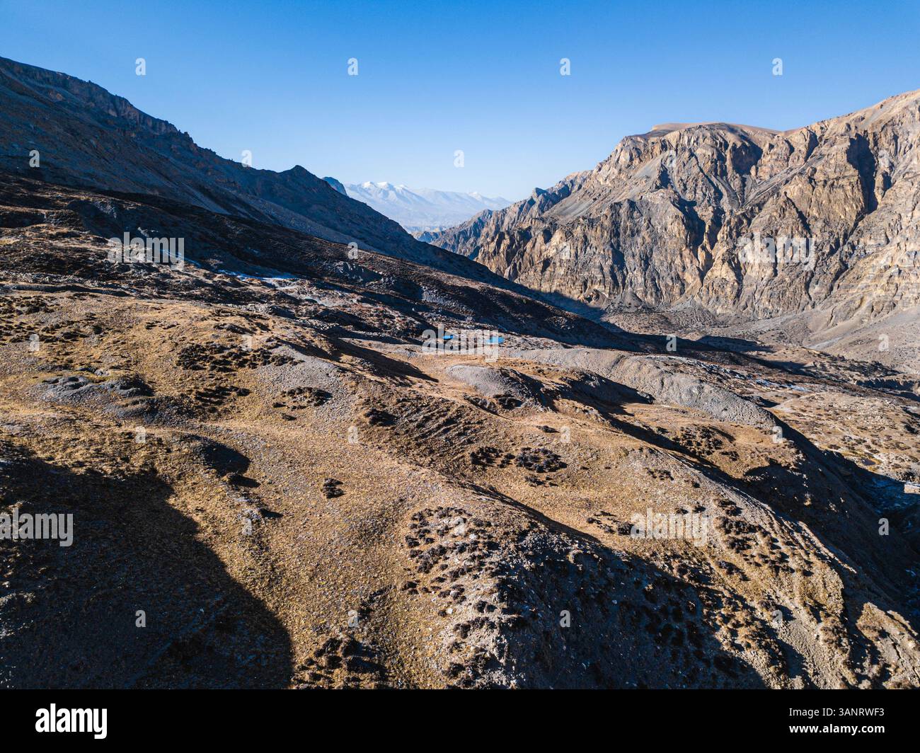 Aerial view of majestic mountains, valley, cliffs, and ridge in remote ...