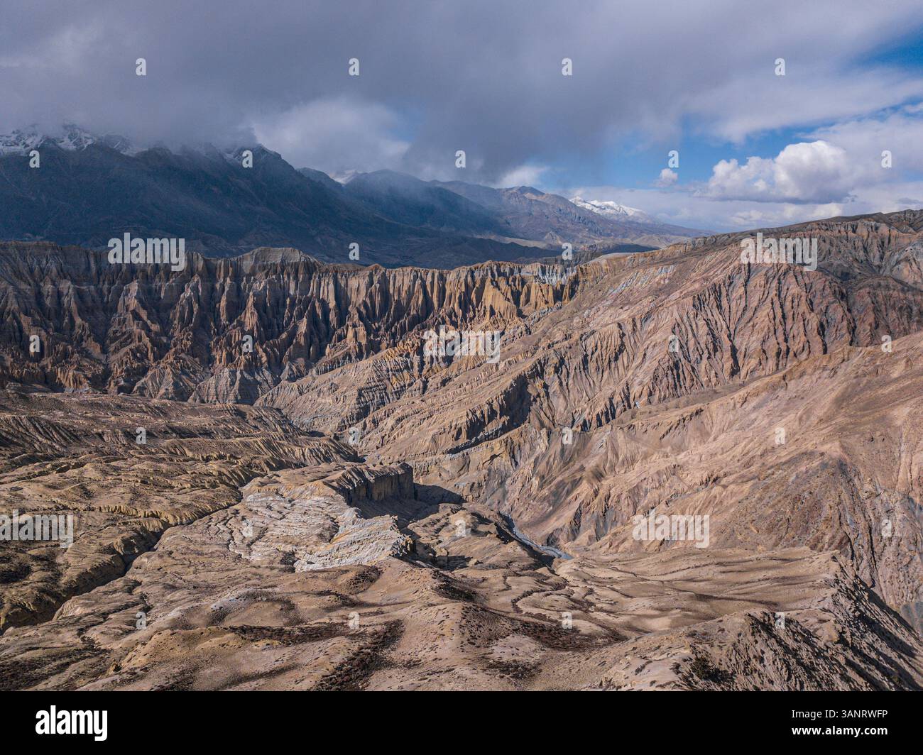 Aerial view of majestic mountains and rugged terrain in Mustang, Nepal ...