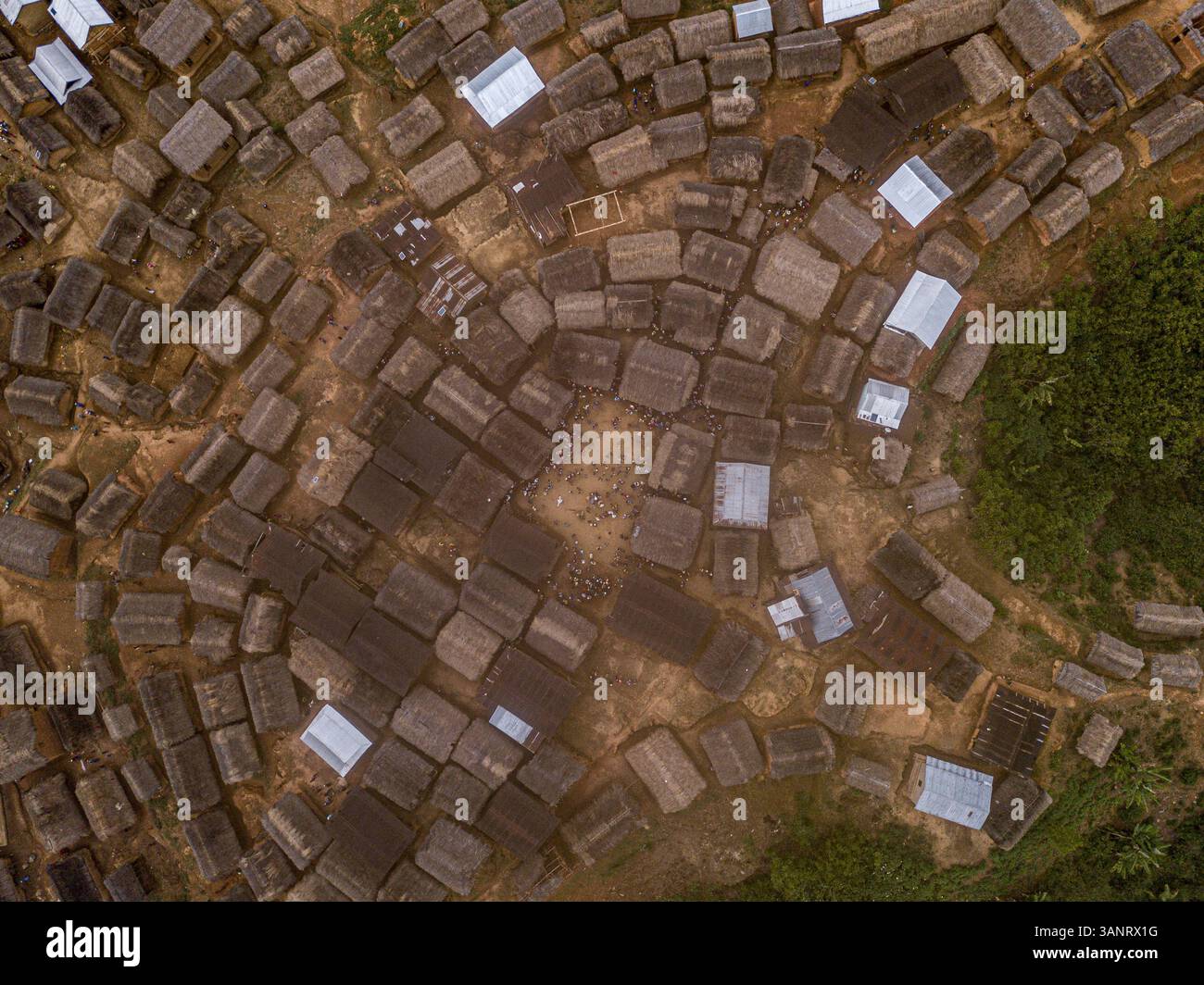 Aerial view of traditional village with thatched roofs in Ampasinambo ...