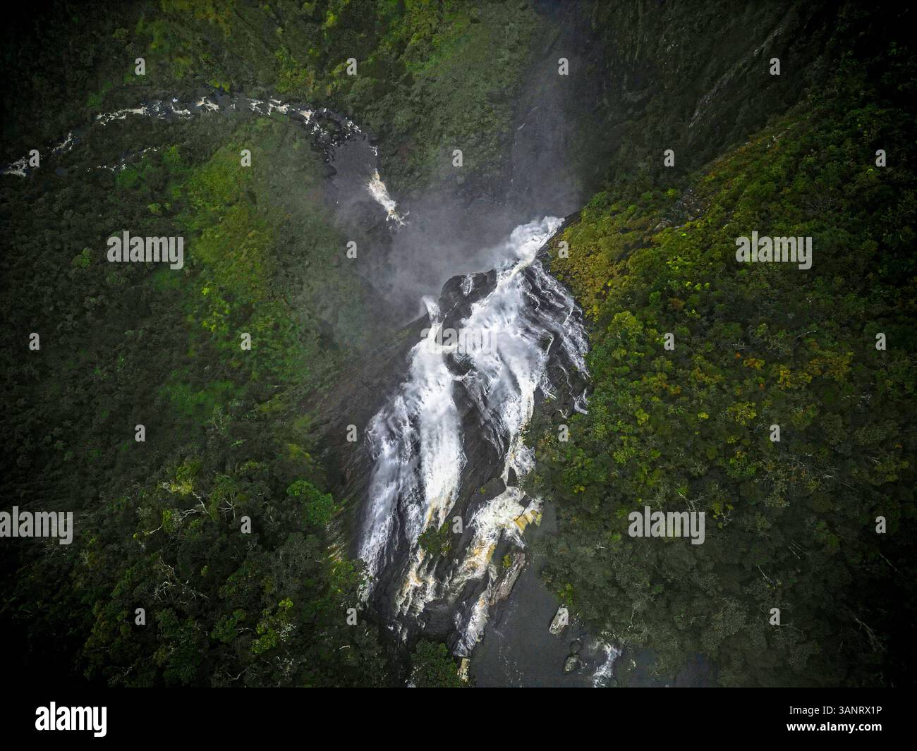 Aerial view of pristine Sakaleona waterfall in lush tropical forest ...