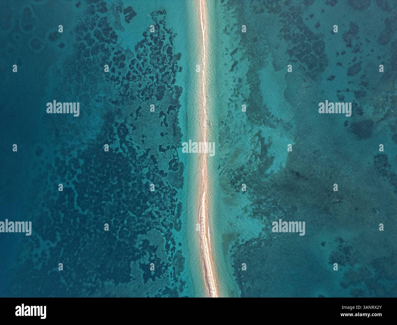 Aerial view of Nosy Lava Island with pristine beach and turquoise water ...