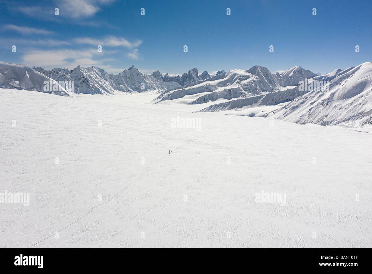 Aerial view of snow-covered Braldu glacier and Lukpe La Pass, Gojal ...