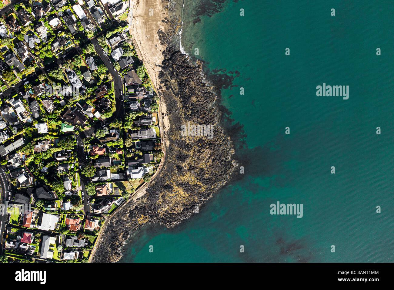 Aerial view of beautiful coastal shoreline with blue ocean waves ...