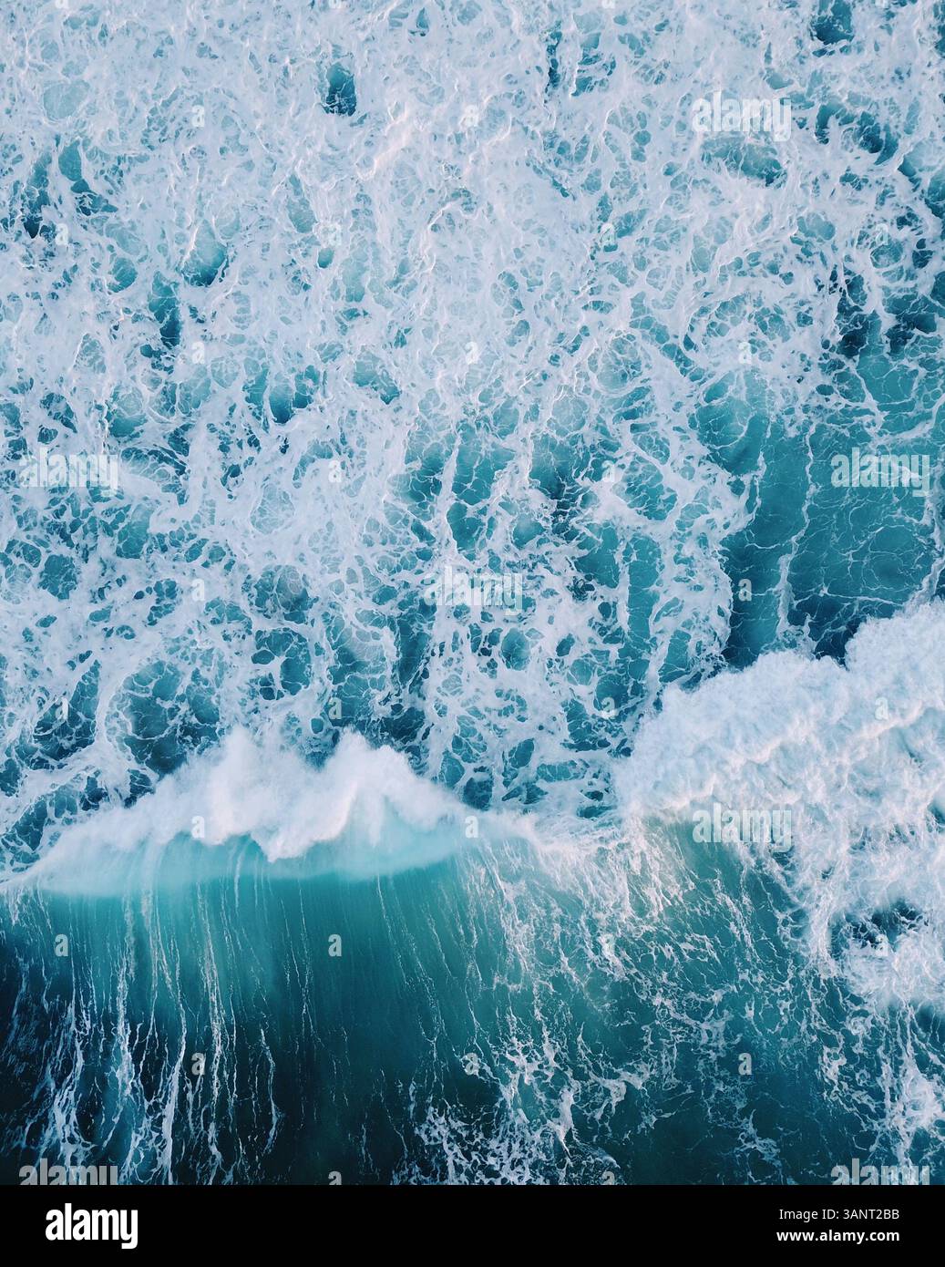 Aerial view of a huge breaking wave in the middle of the Atlantic ocean ...