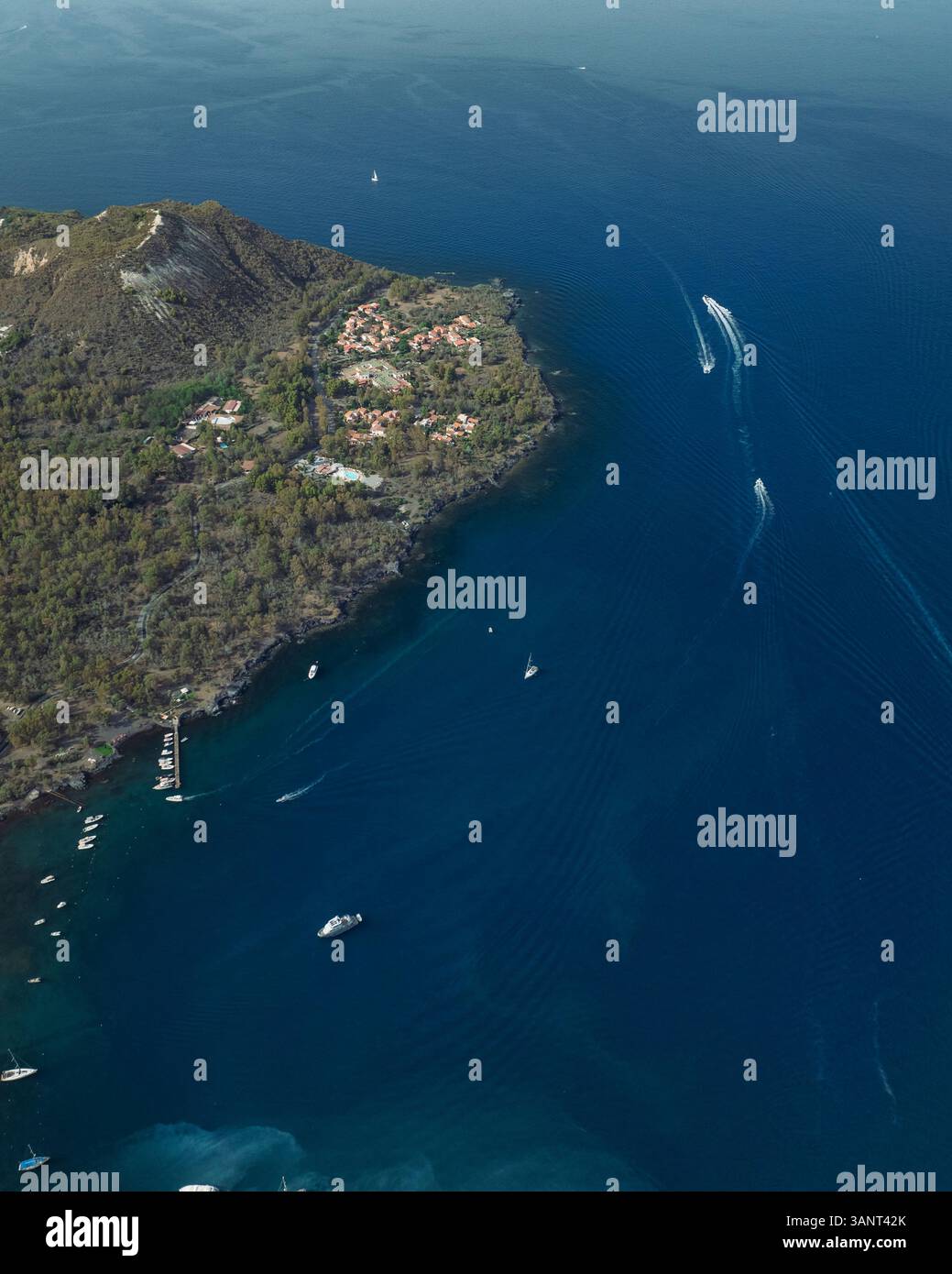Aerial view of boats along the coastline in Vulcano island, Aeolian ...