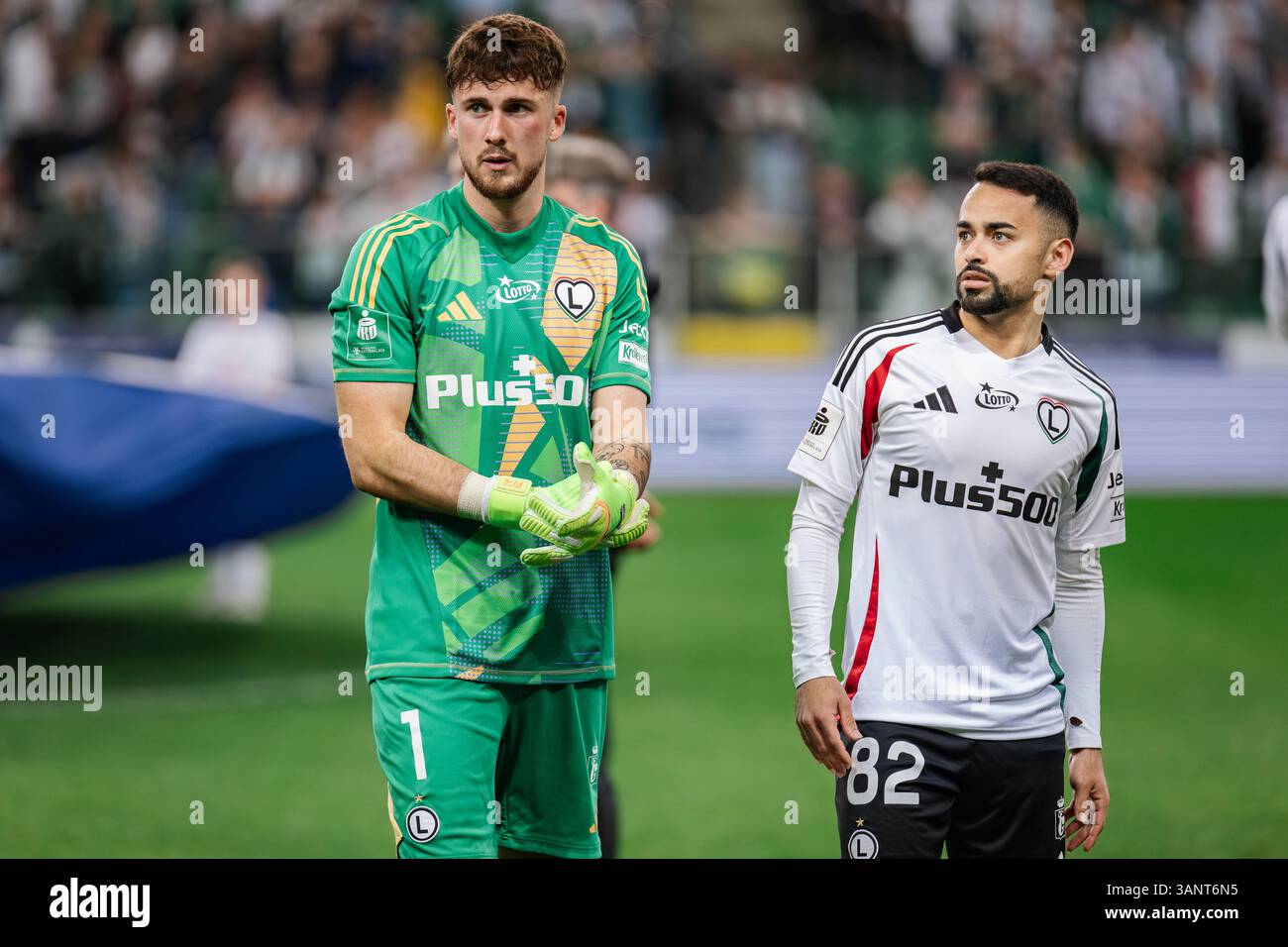Warsaw, Poland. 13th Apr, 2025. Kacper Tobiasz (L) and Lucas Lima ...