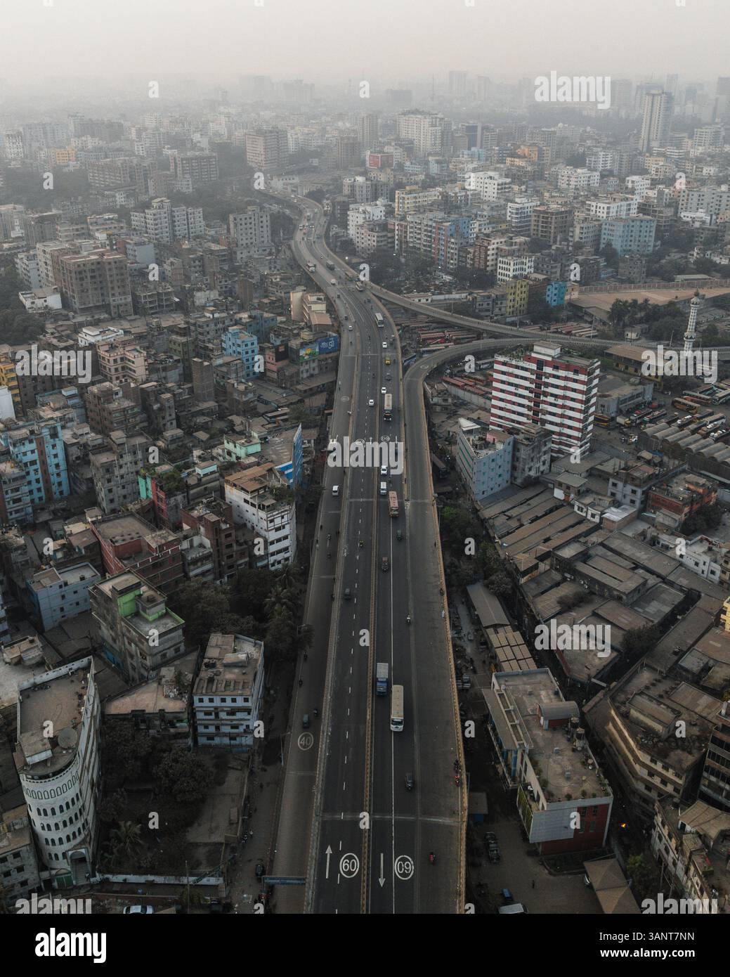 Aerial view of bustling cityscape with modern buildings and busy ...