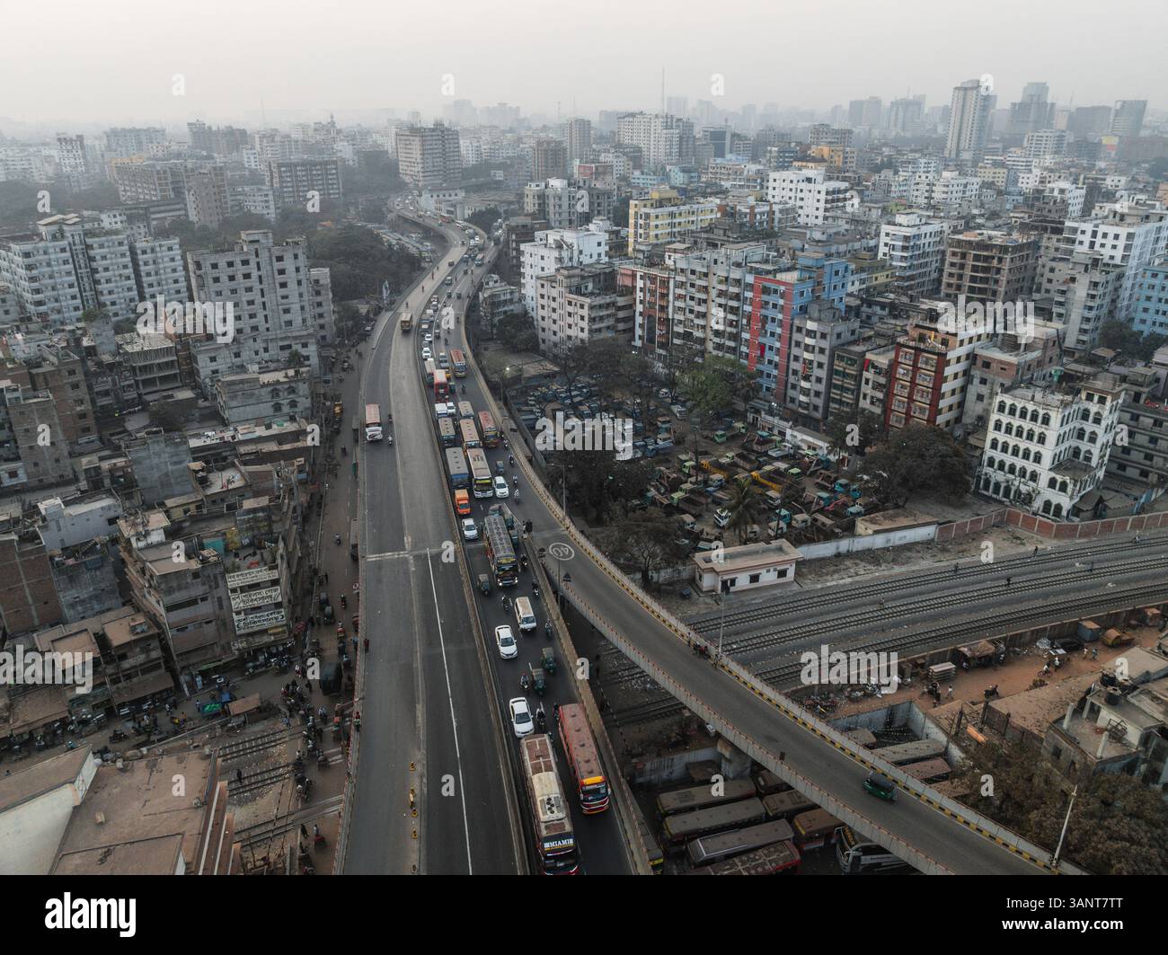 Aerial view of bustling cityscape with modern buildings and busy roads ...