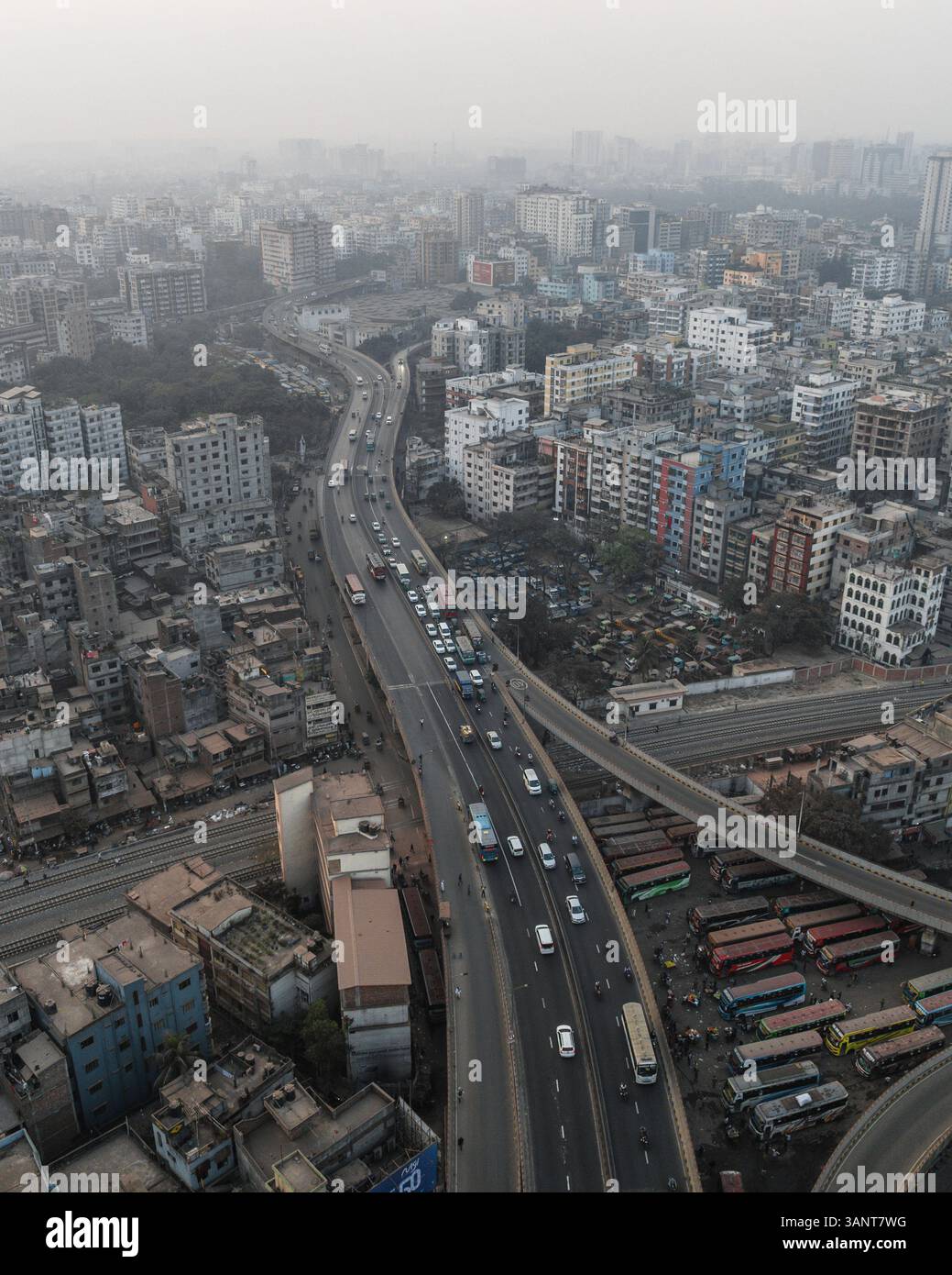 Aerial view of busy urban landscape with highways and buildings ...